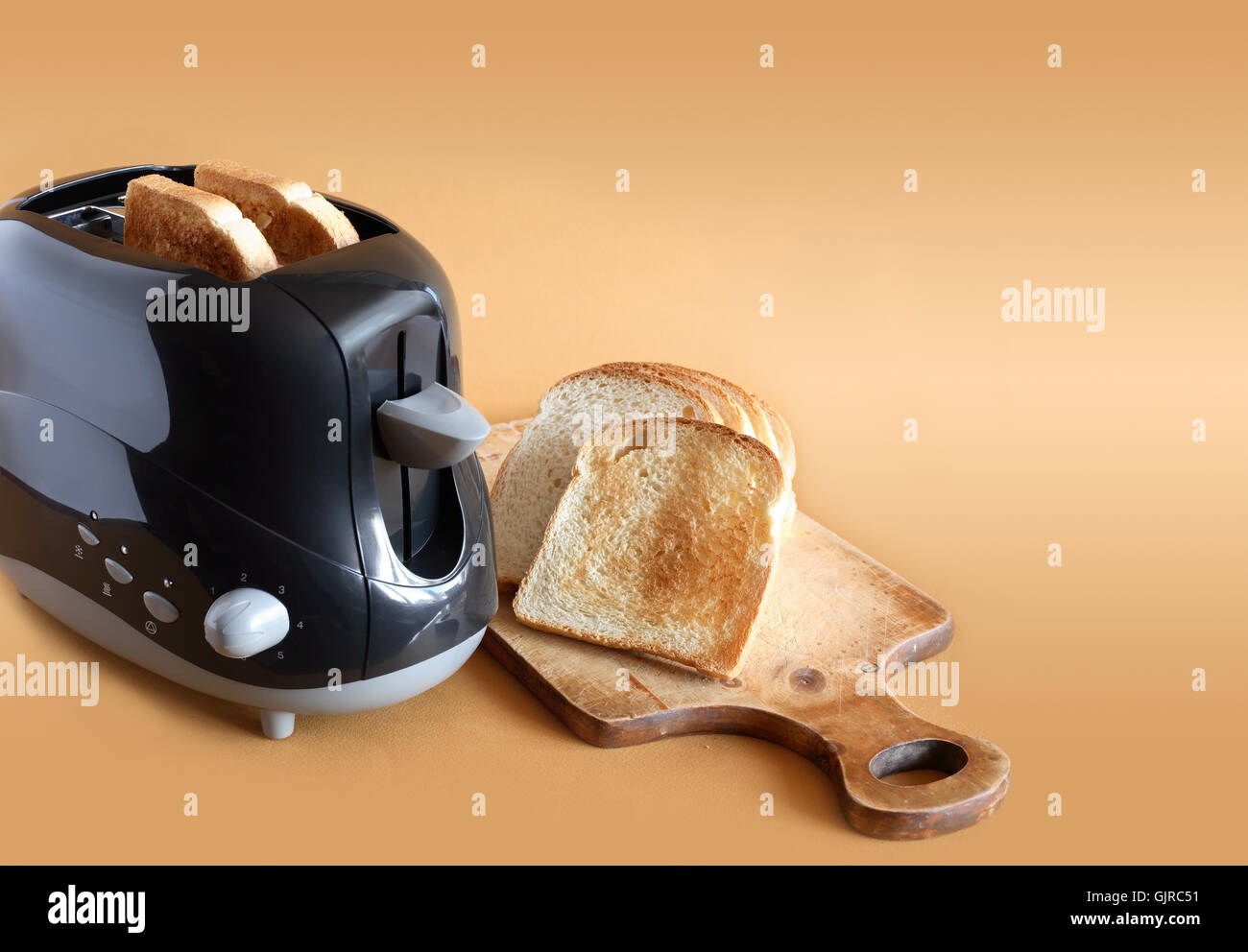 Toaster And Toasts Stock Photo - Alamy