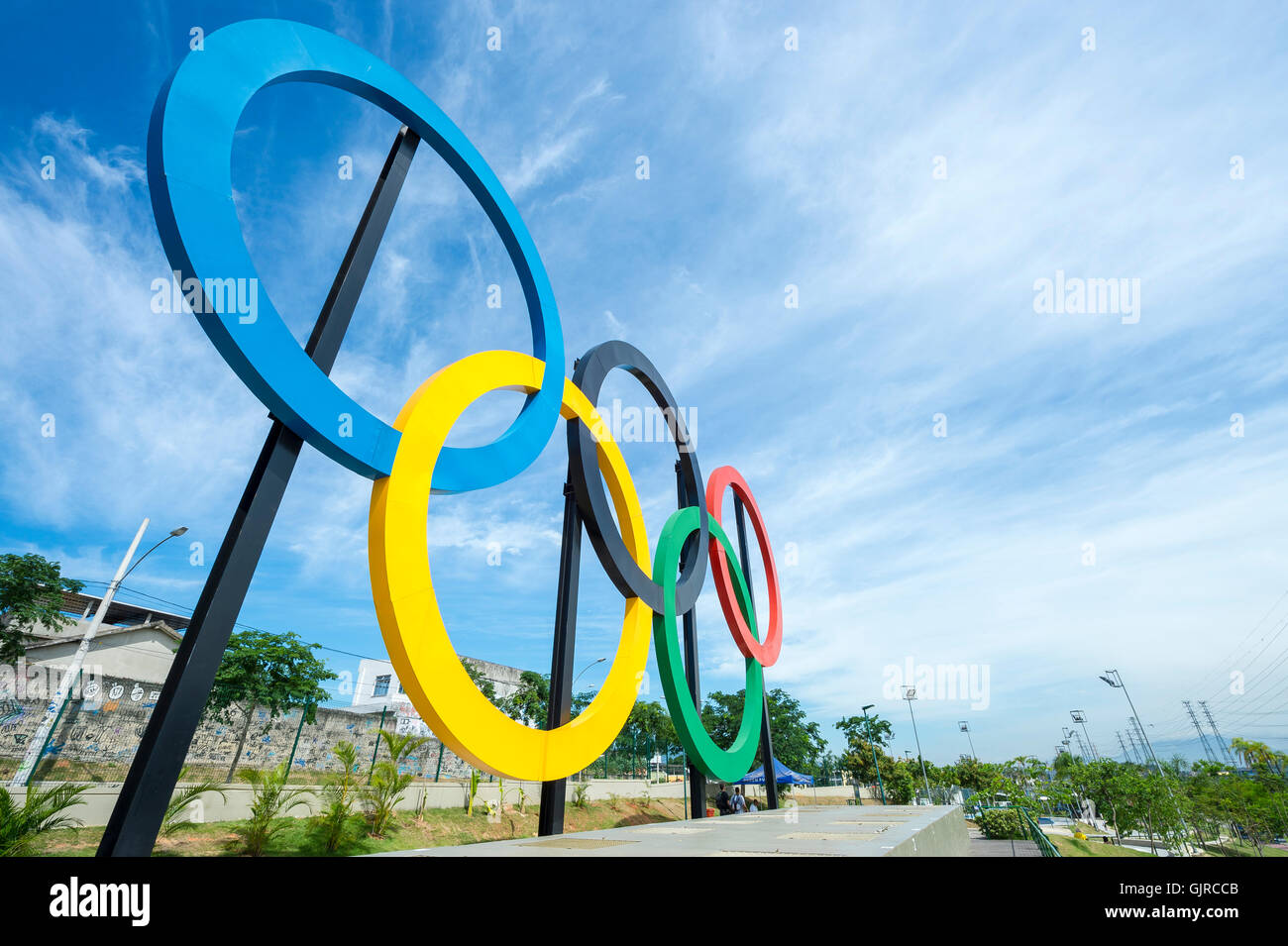 RIO DE JANEIRO - MARCH 18, 2016: Olympic rings stand against blue sky ...