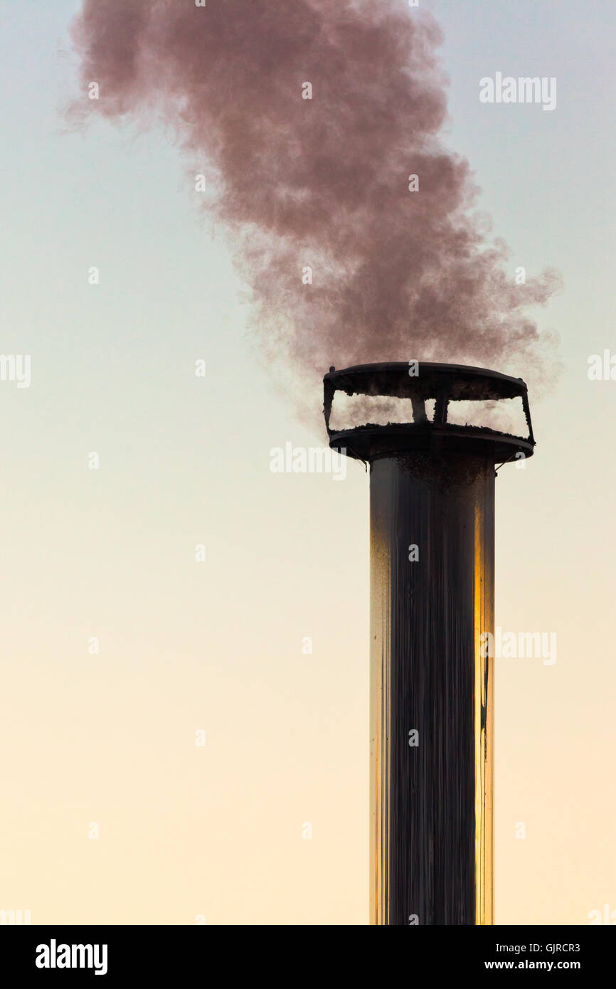 Black smoking chimney Stock Photo - Alamy