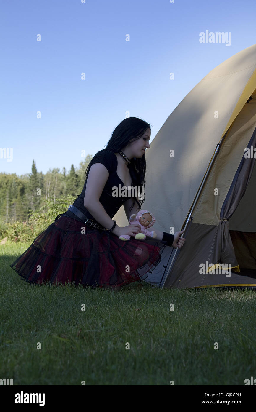 Goth girl camping Stock Photo - Alamy