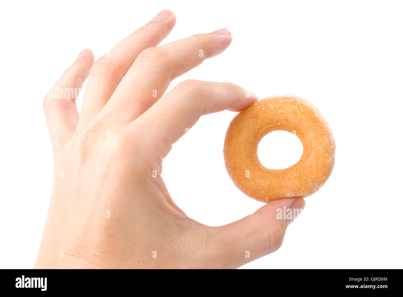 Donut in hand hi-res stock photography and images - Alamy