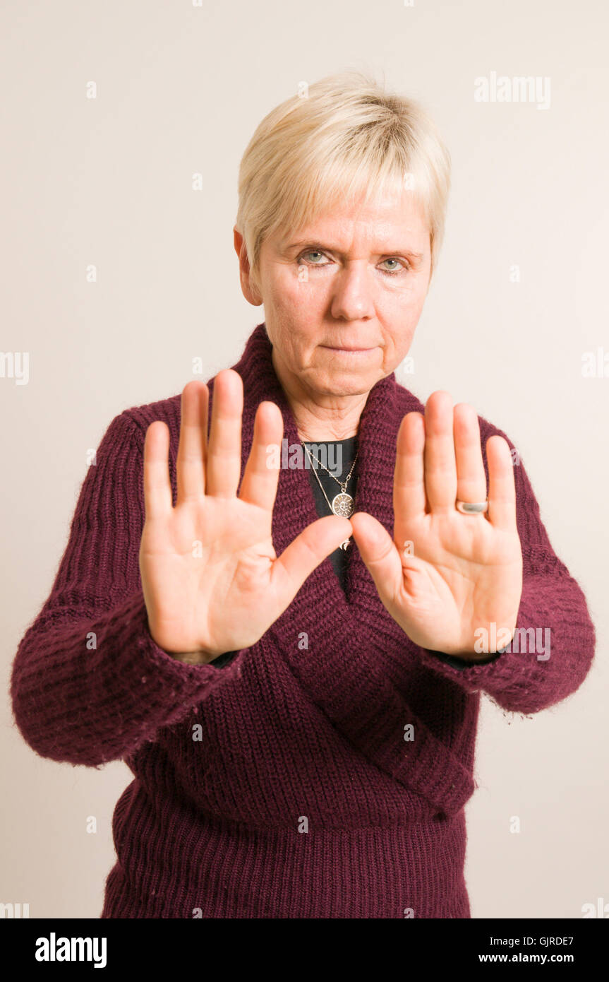 mature woman repulse Stock Photo - Alamy