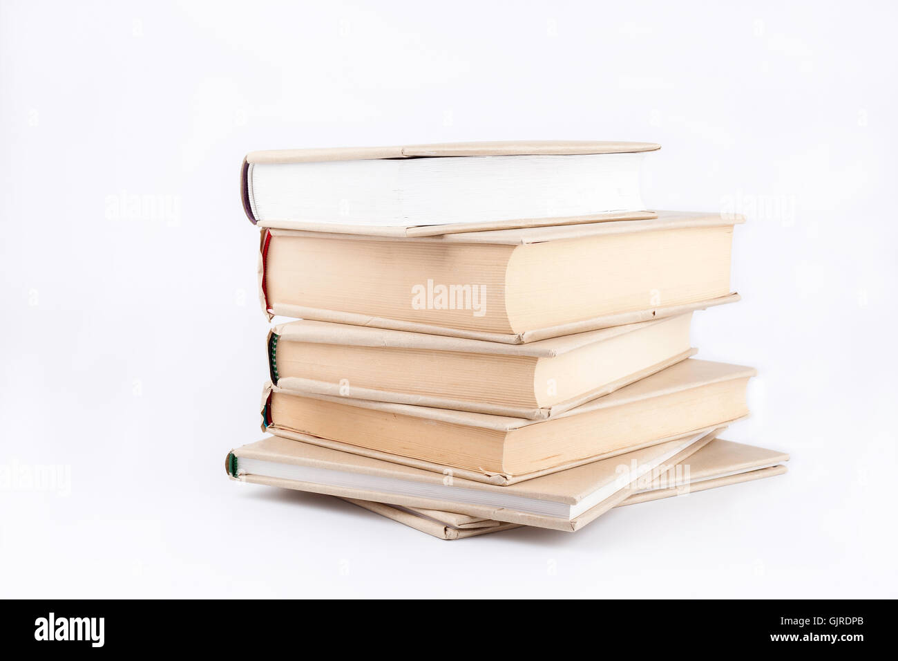 Stack of books on a white background Stock Photo - Alamy