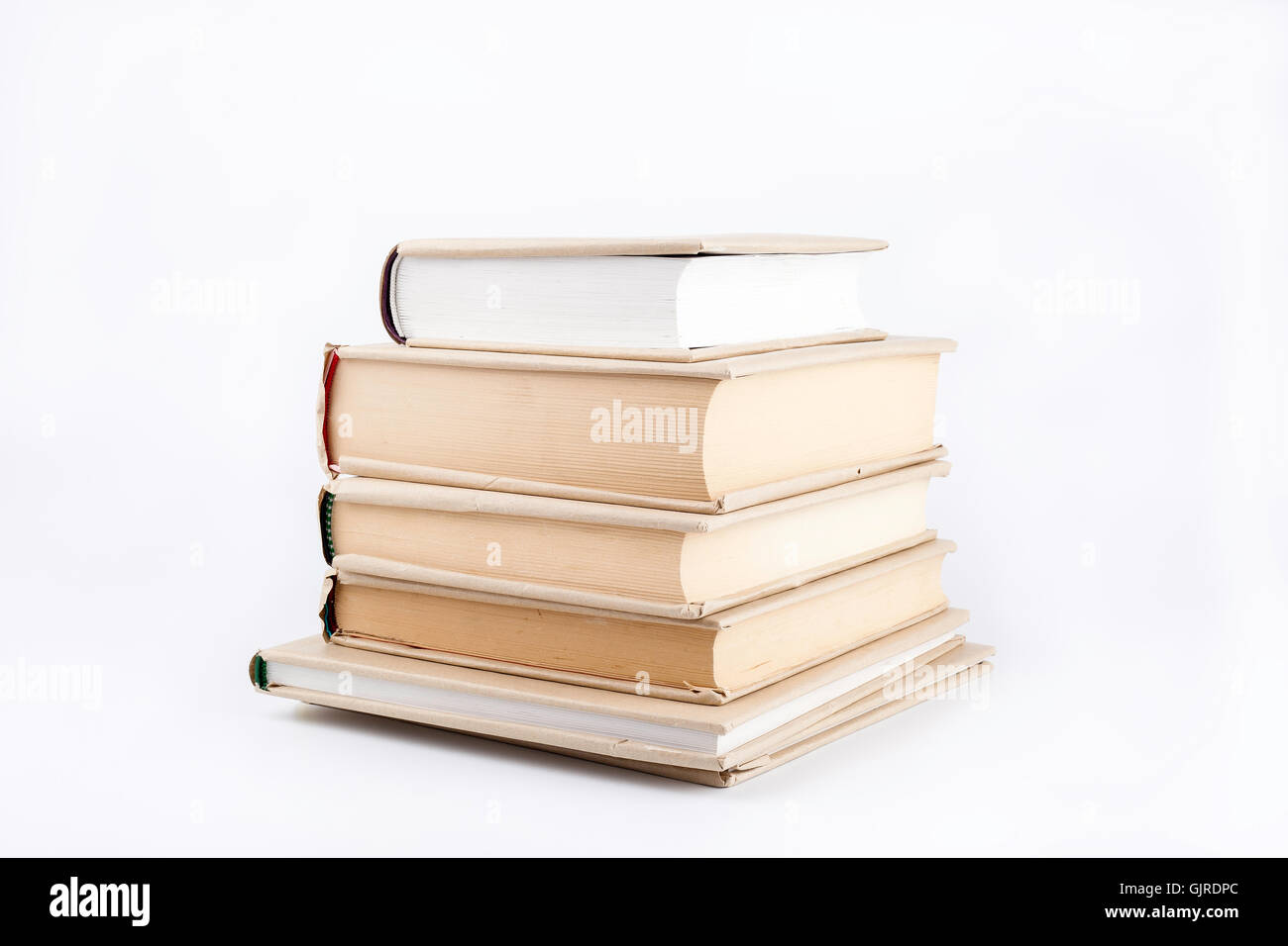 Stack of books on a white background Stock Photo - Alamy