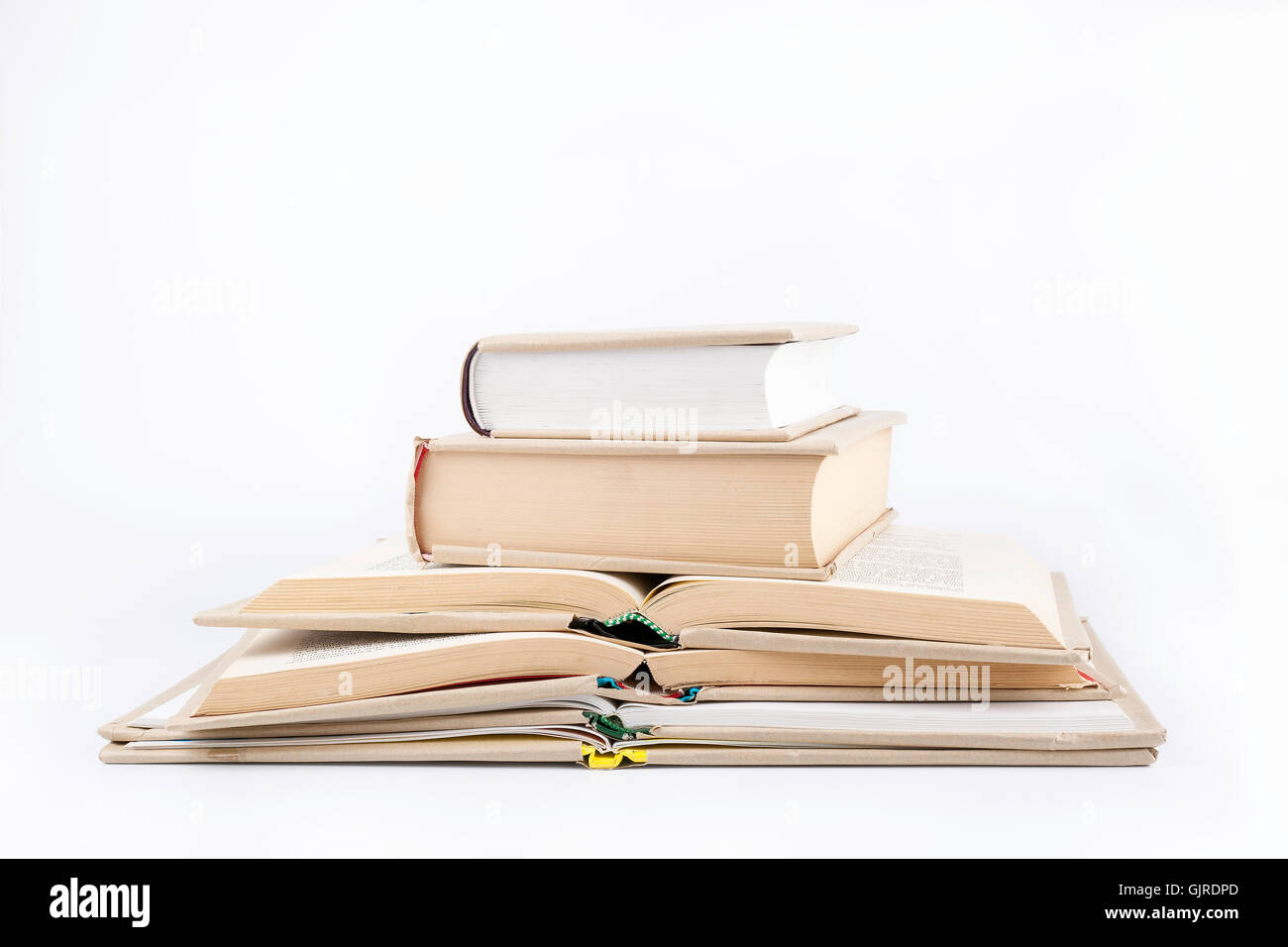 Stack of books on a white background Stock Photo - Alamy