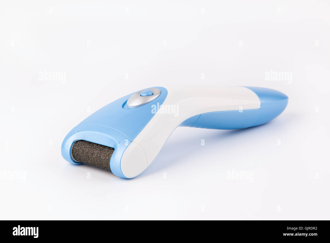 Electric foot file on a white background Stock Photo - Alamy