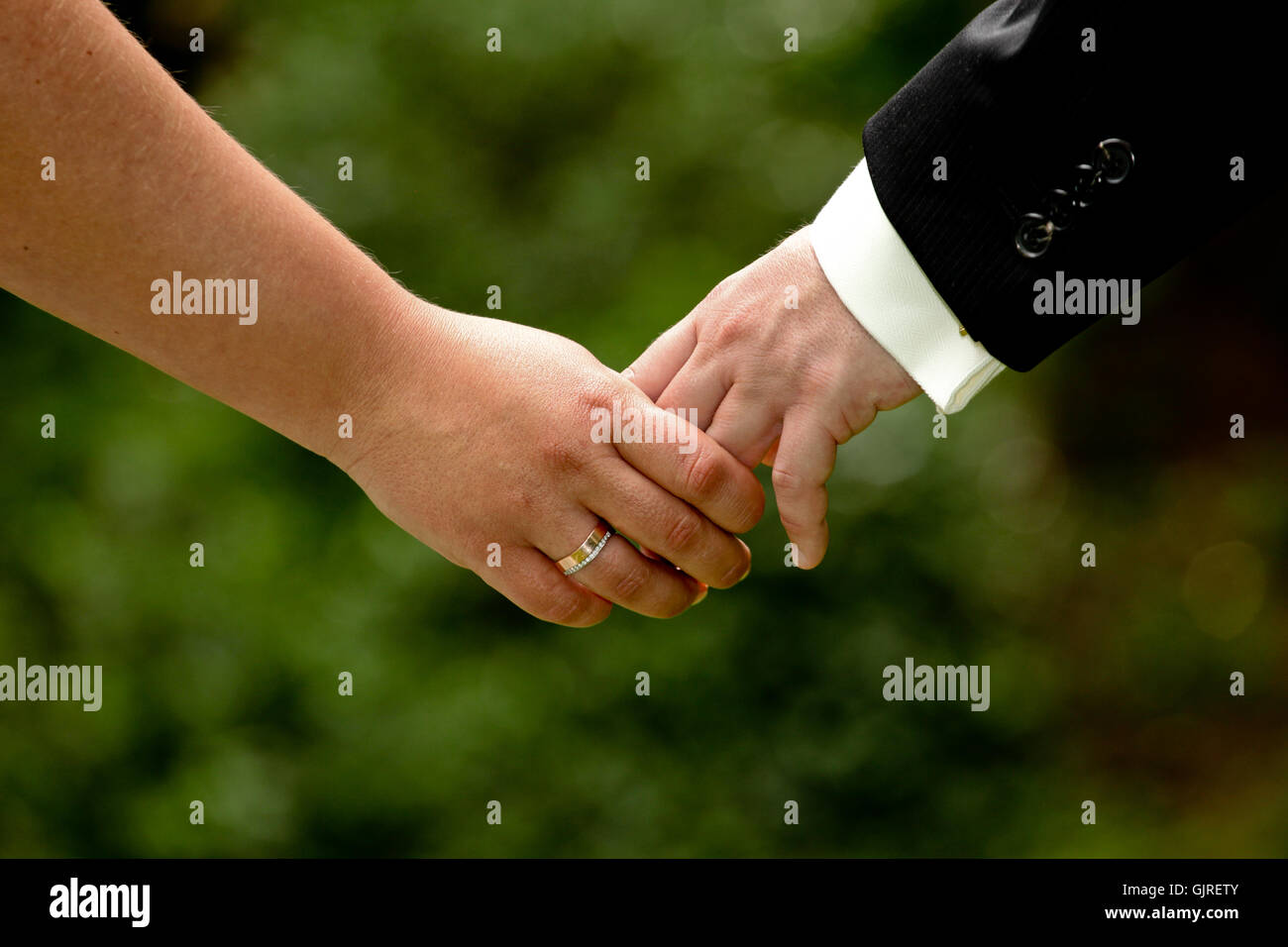hand in hand Stock Photo - Alamy
