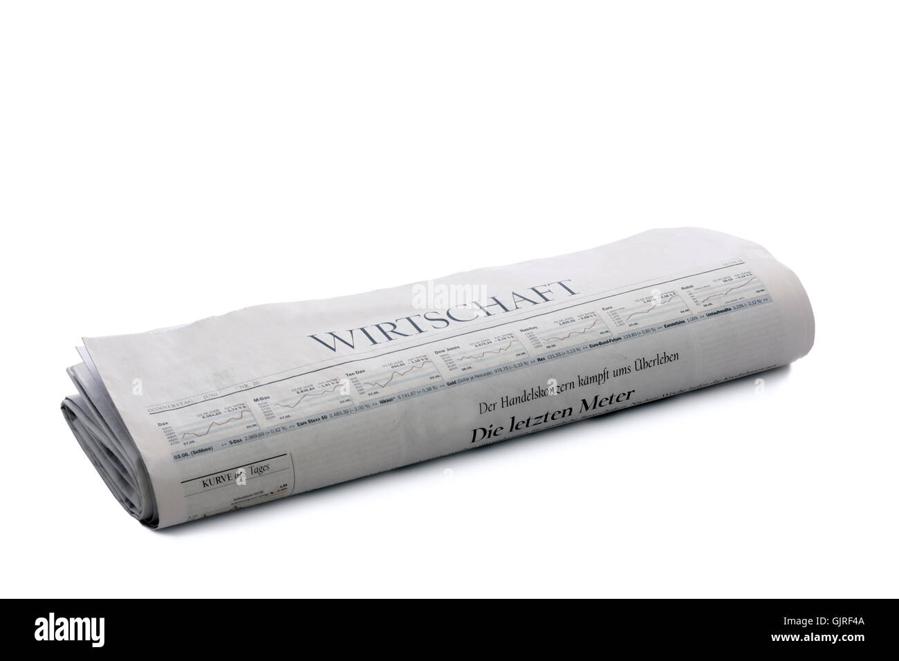 Rolled up newspaper hi-res stock photography and images - Alamy
