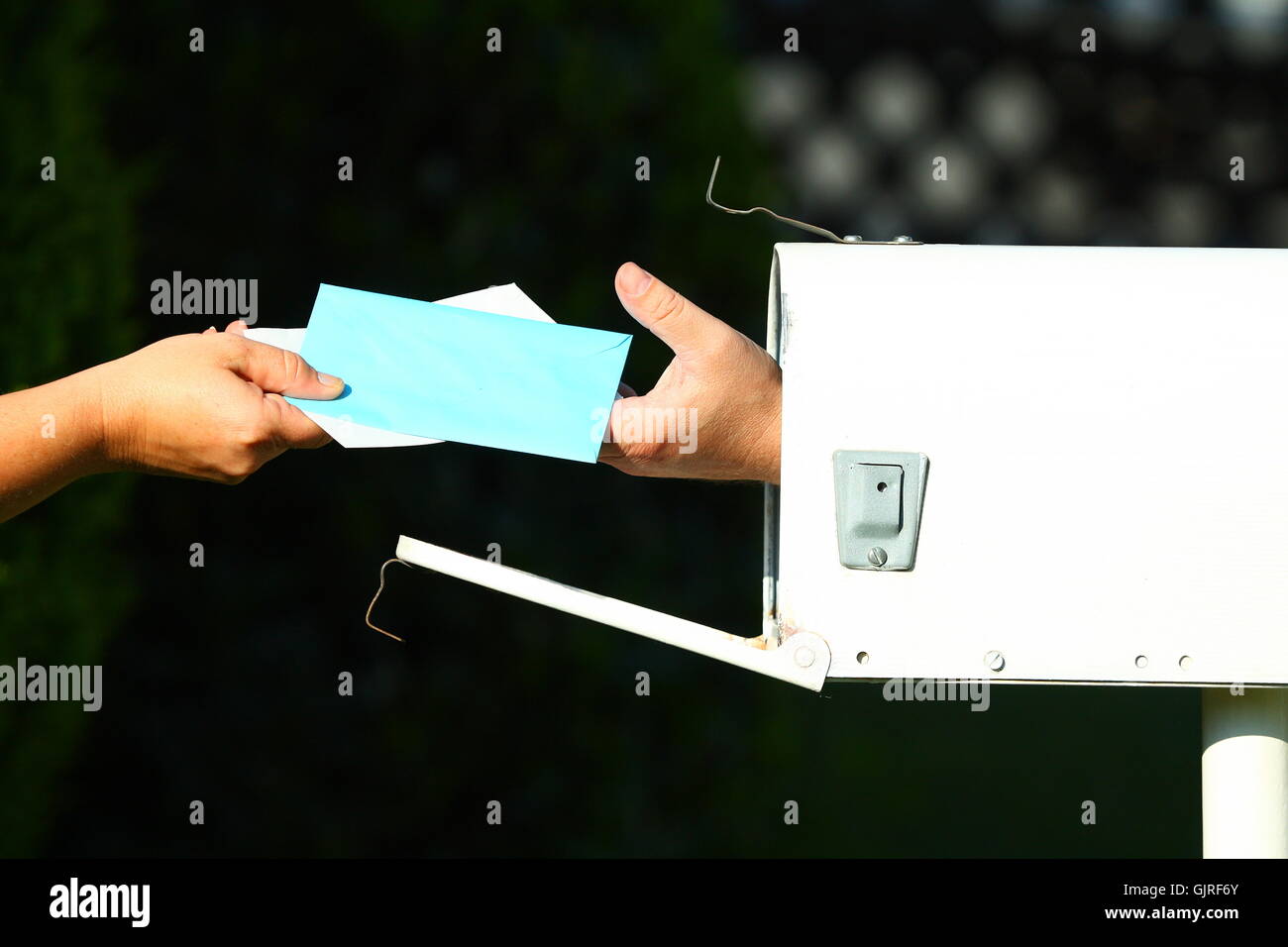 Postman hands hi-res stock photography and images - Alamy