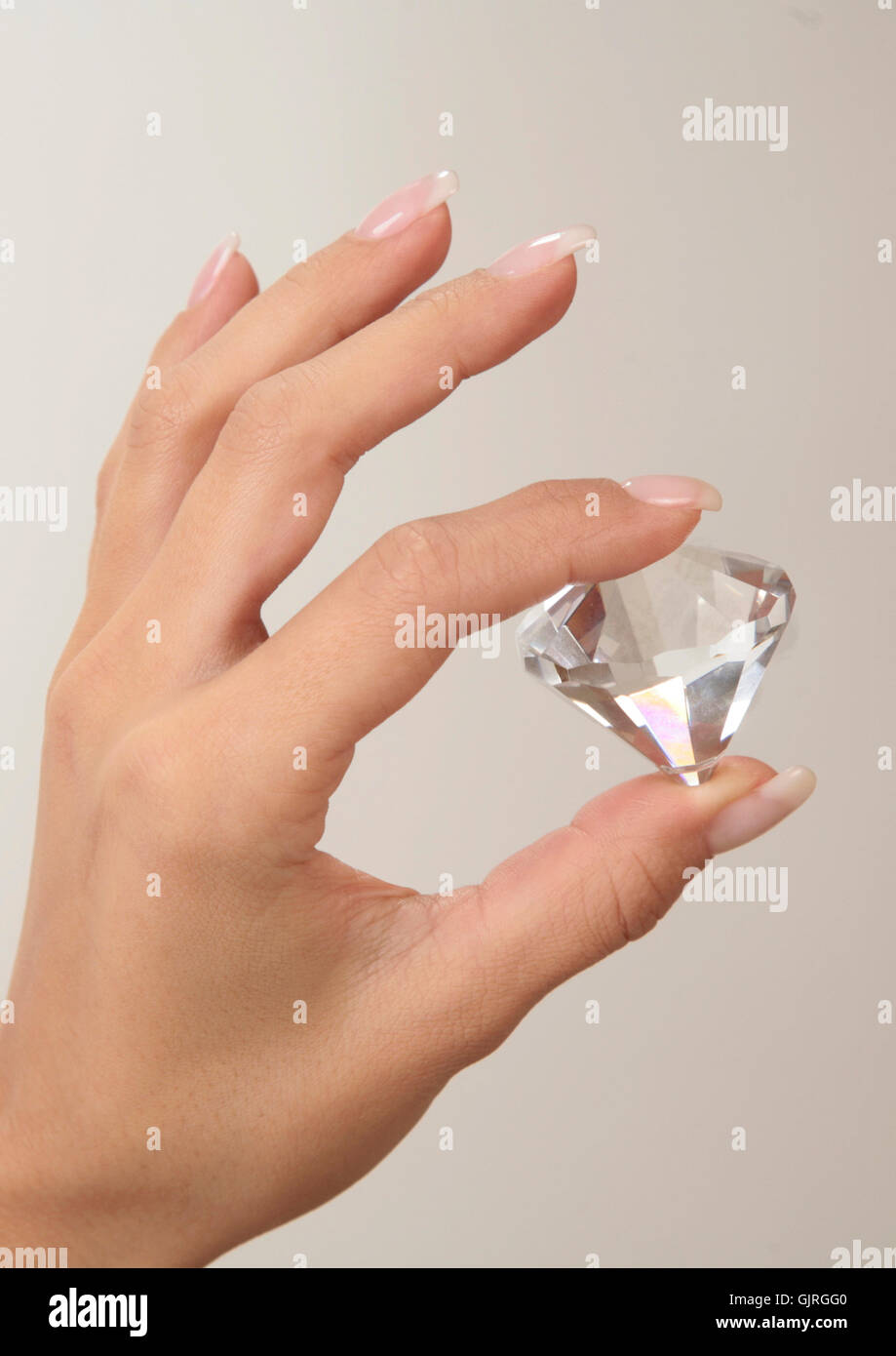 hand with gem Stock Photo - Alamy