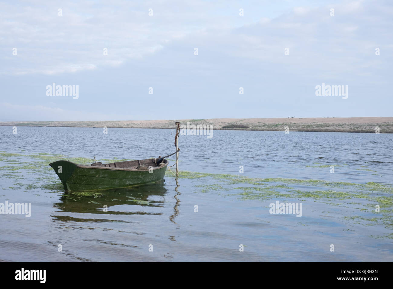 rowing boat moored on the fleet lagoon Stock Photo - Alamy