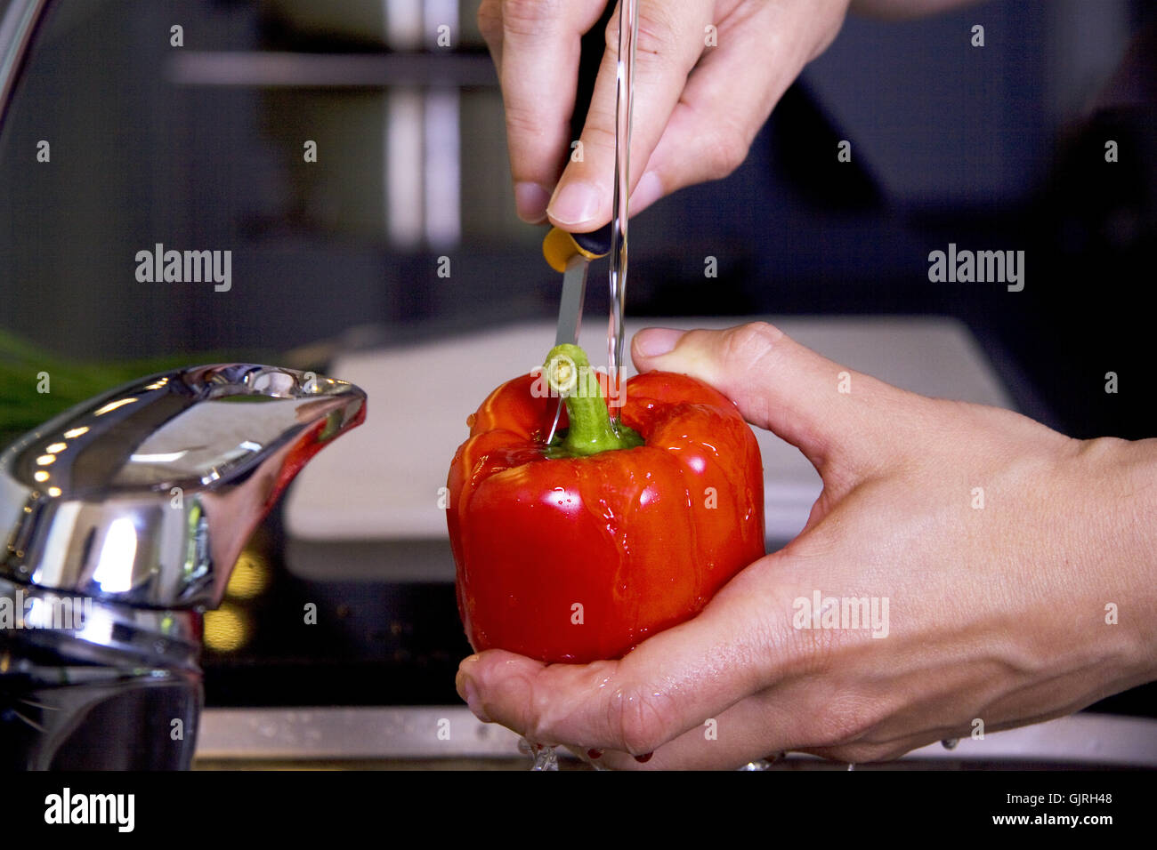 pepper wash washing Stock Photo - Alamy
