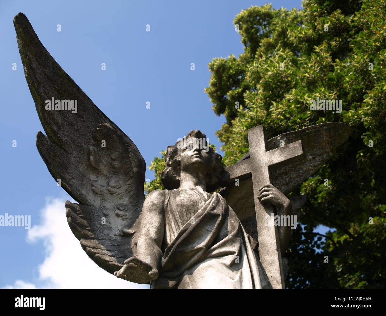 angel with cross Stock Photo - Alamy