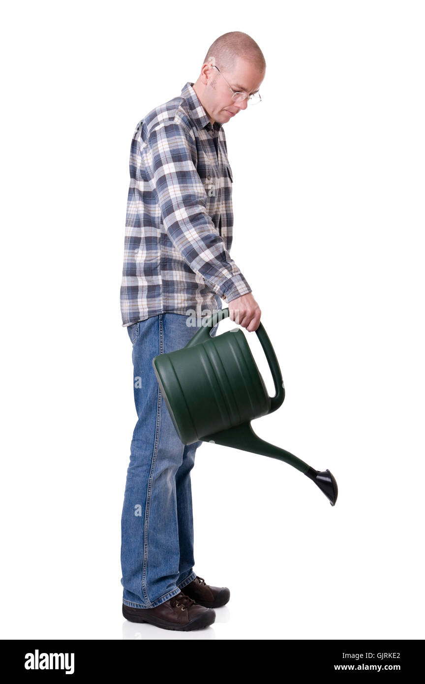 man with watering can Stock Photo - Alamy