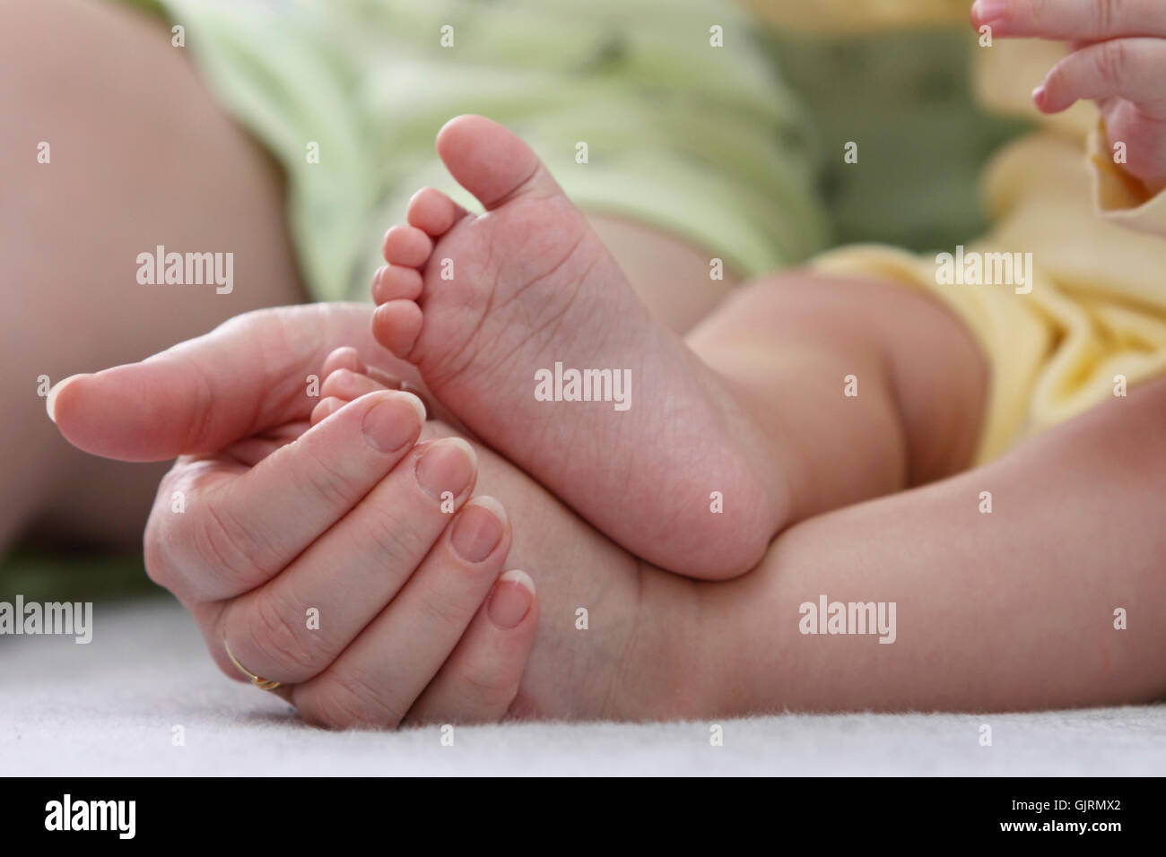 hand baby foot Stock Photo - Alamy