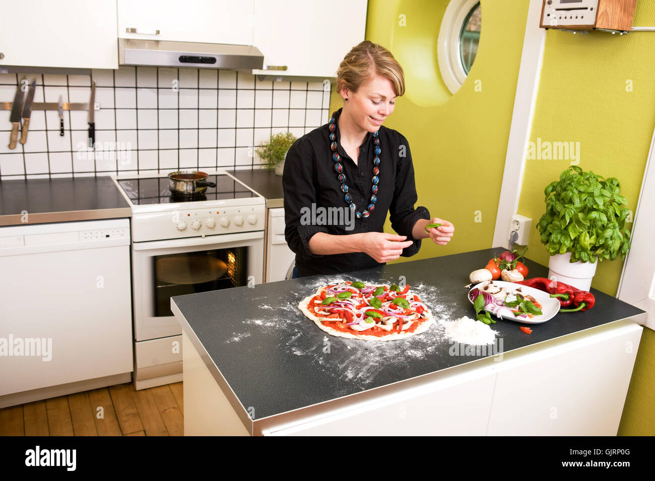 woman house building Stock Photo - Alamy