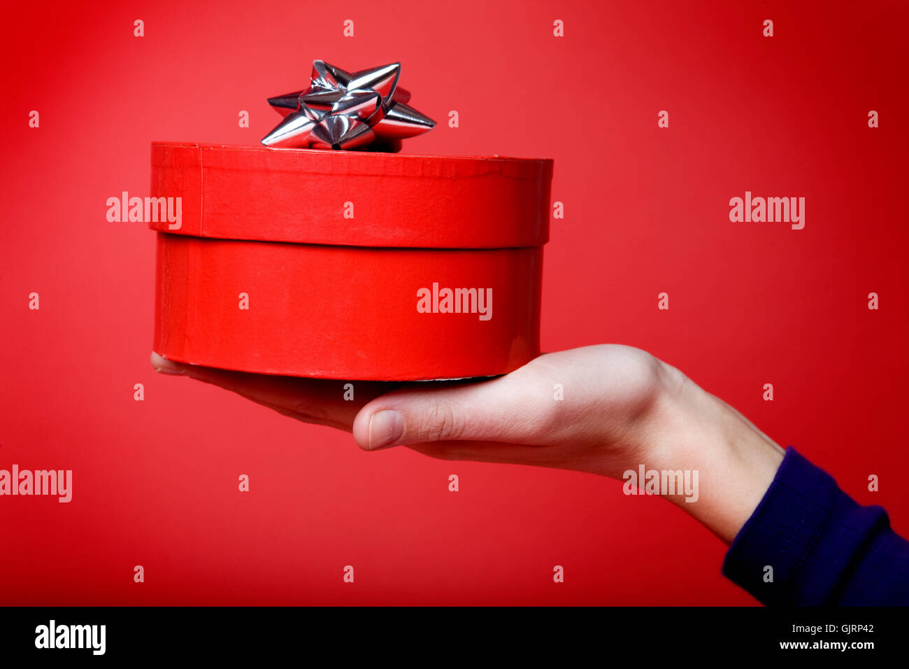 woman present big Stock Photo - Alamy