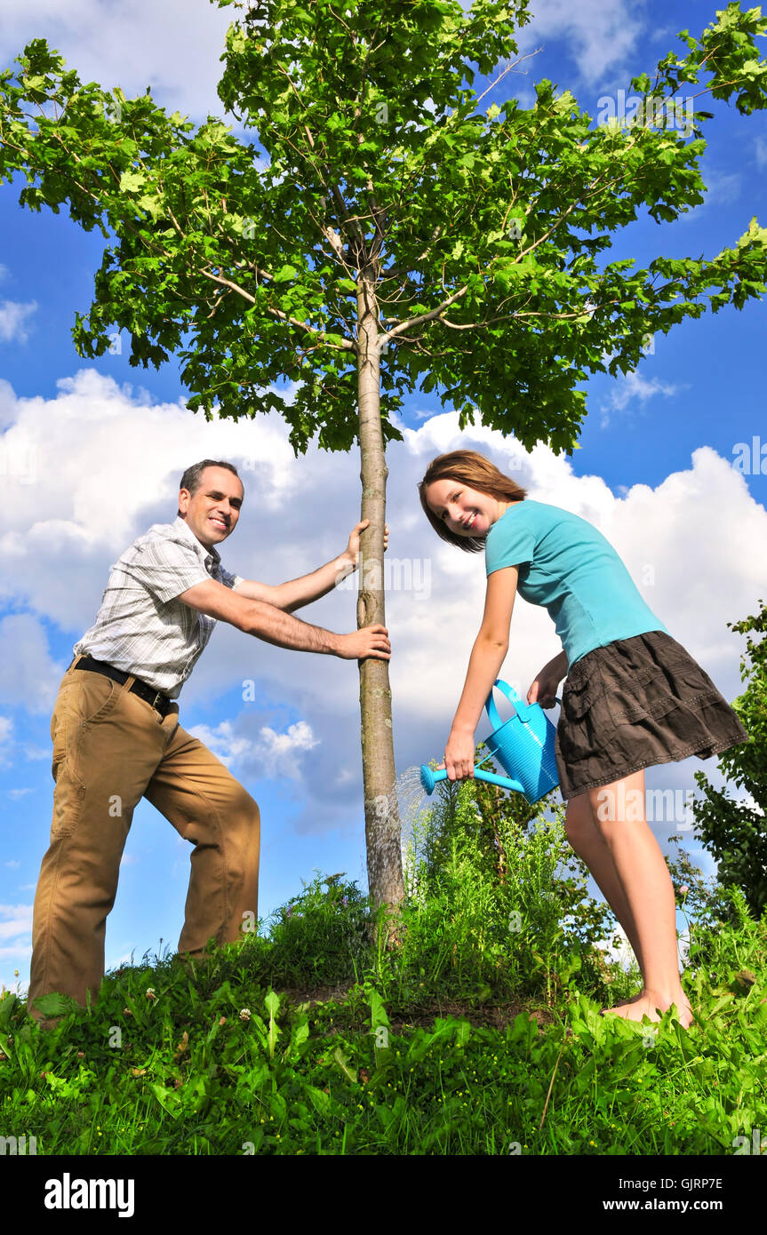 Teenagers planting garden hi-res stock photography and images - Alamy