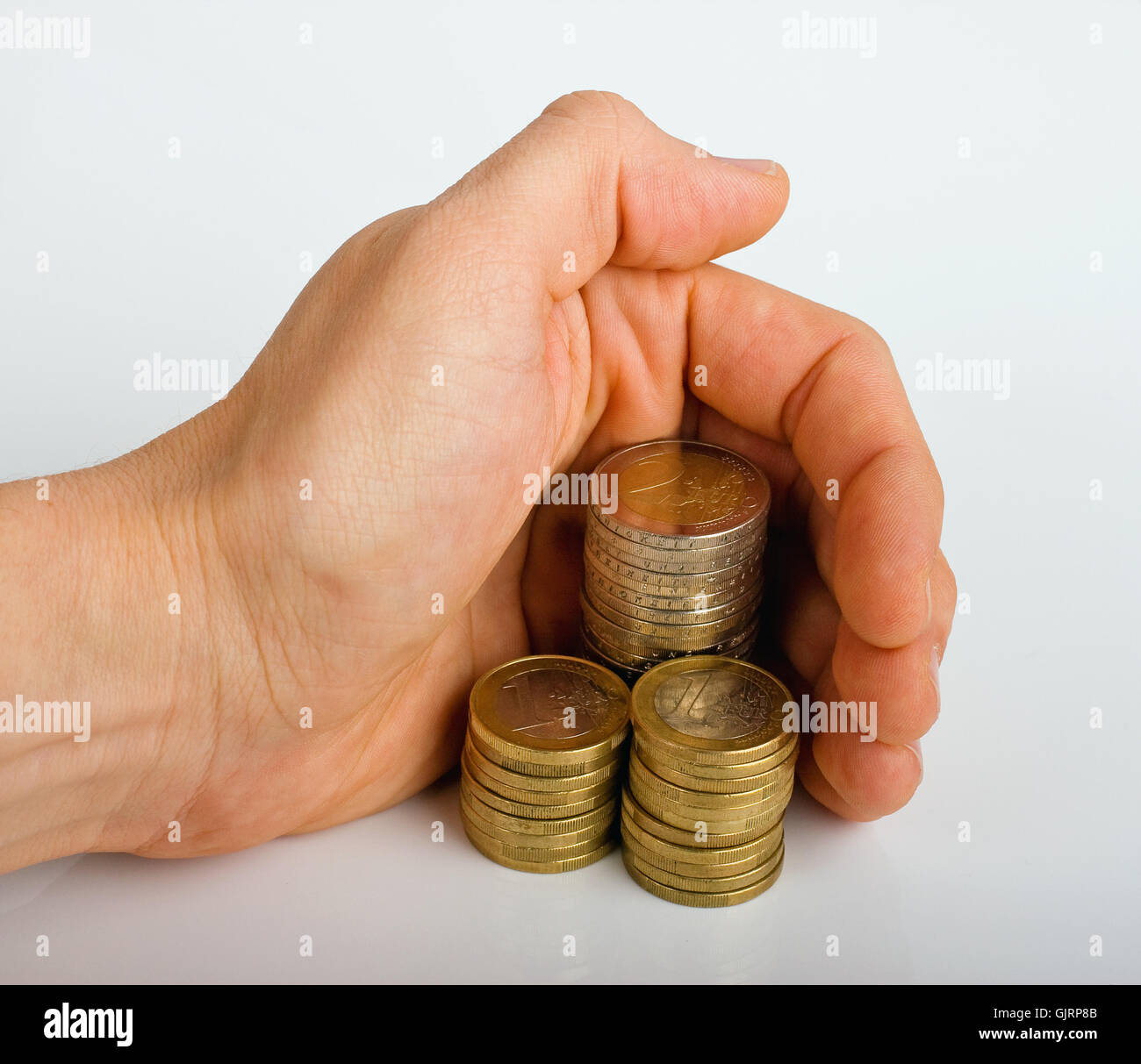 hand euro coins Stock Photo - Alamy