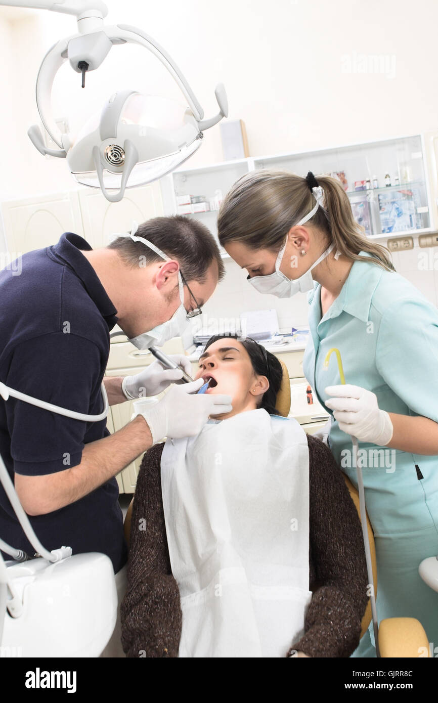 Dental treatment collaboration hi-res stock photography and images - Alamy