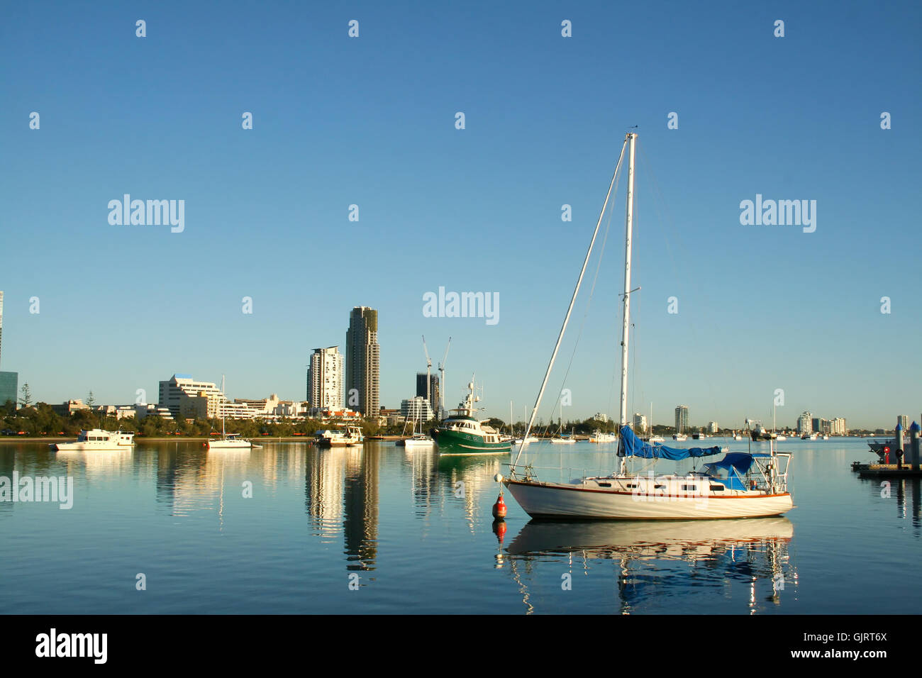 sunrise dawn boats Stock Photo - Alamy