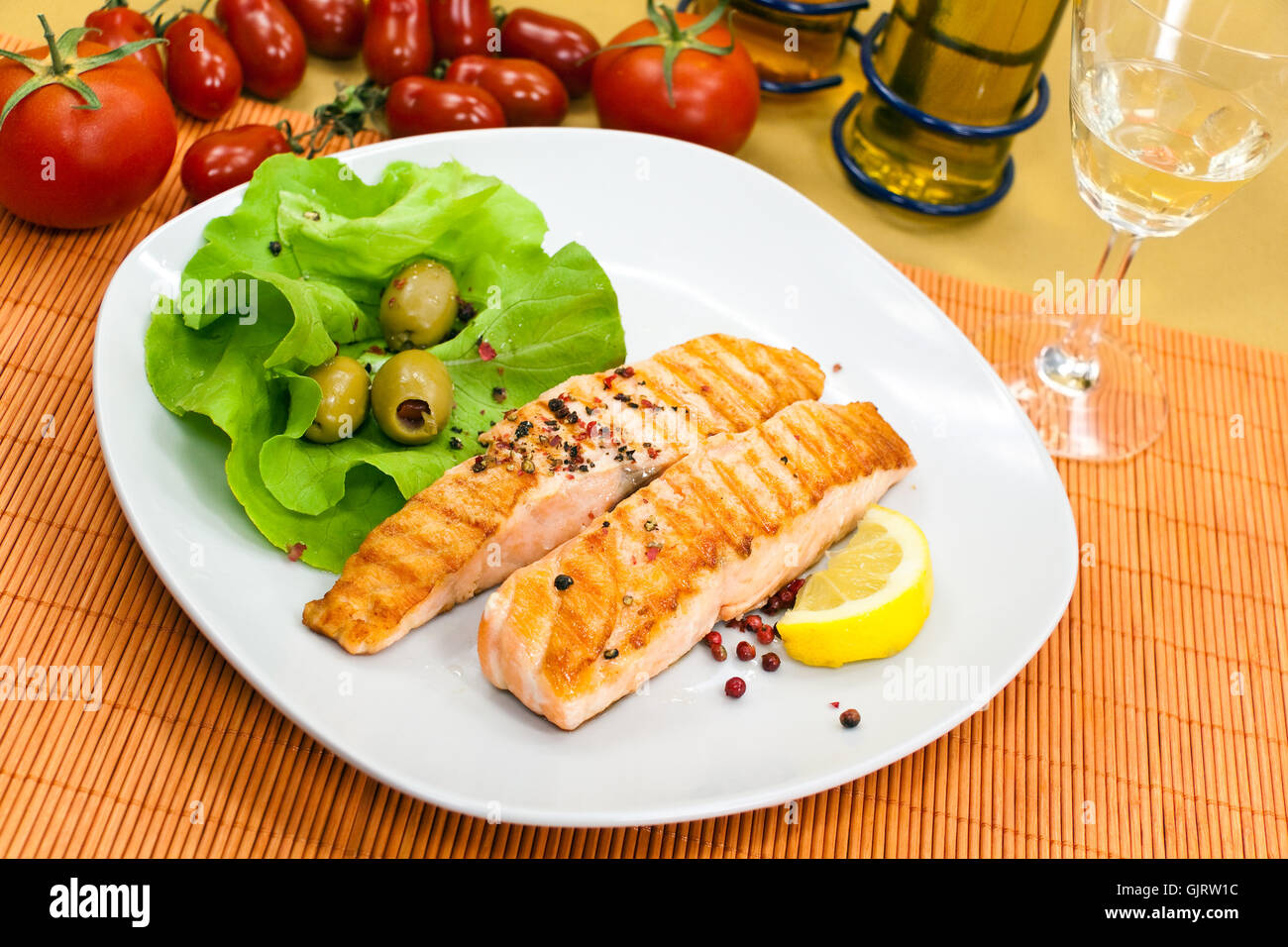 fish olive grill Stock Photo - Alamy