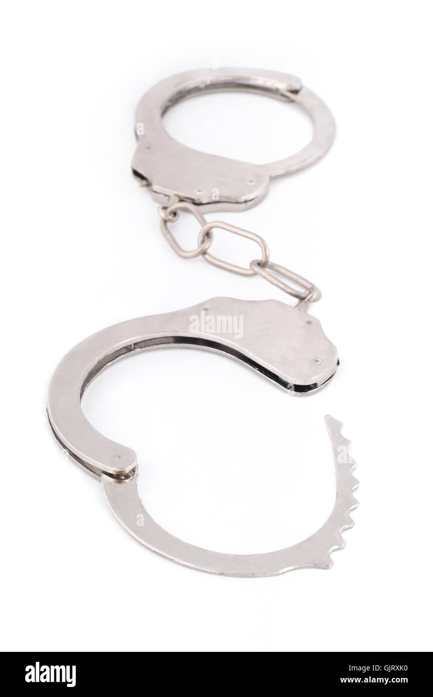 metal manacle handcuffs Stock Photo - Alamy