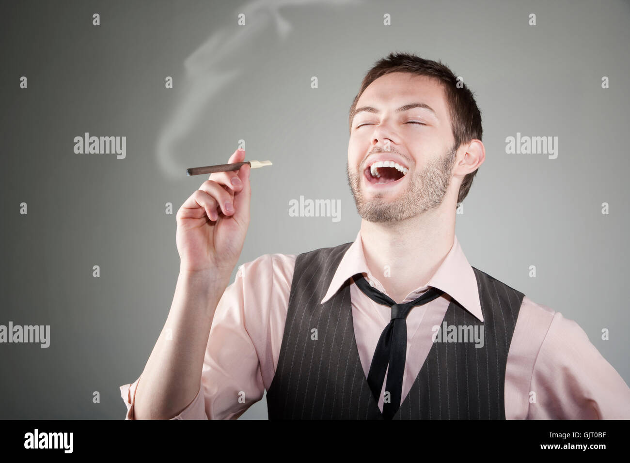 cigar laugh laughs Stock Photo - Alamy