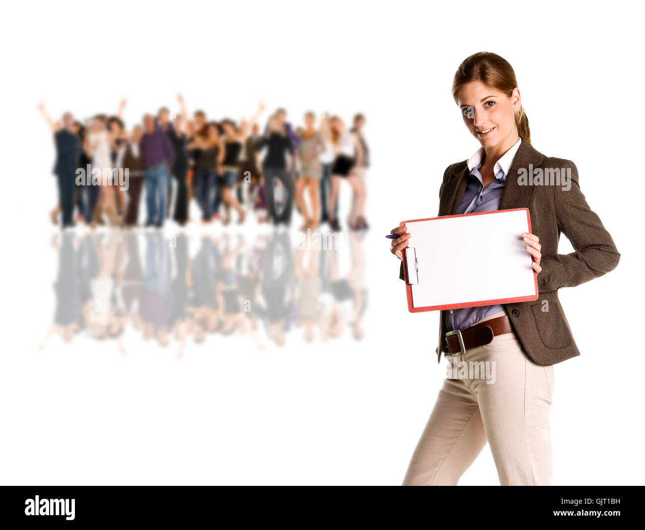 crowd and woman in foreground Stock Photo - Alamy