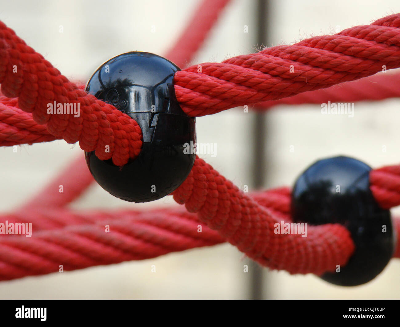 red with black mesh ball Stock Photo - Alamy