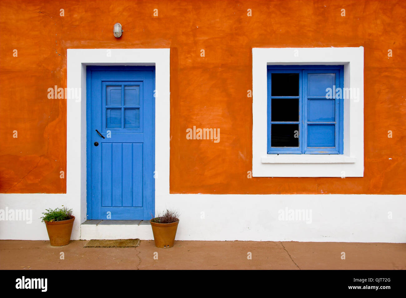 blue house building Stock Photo - Alamy