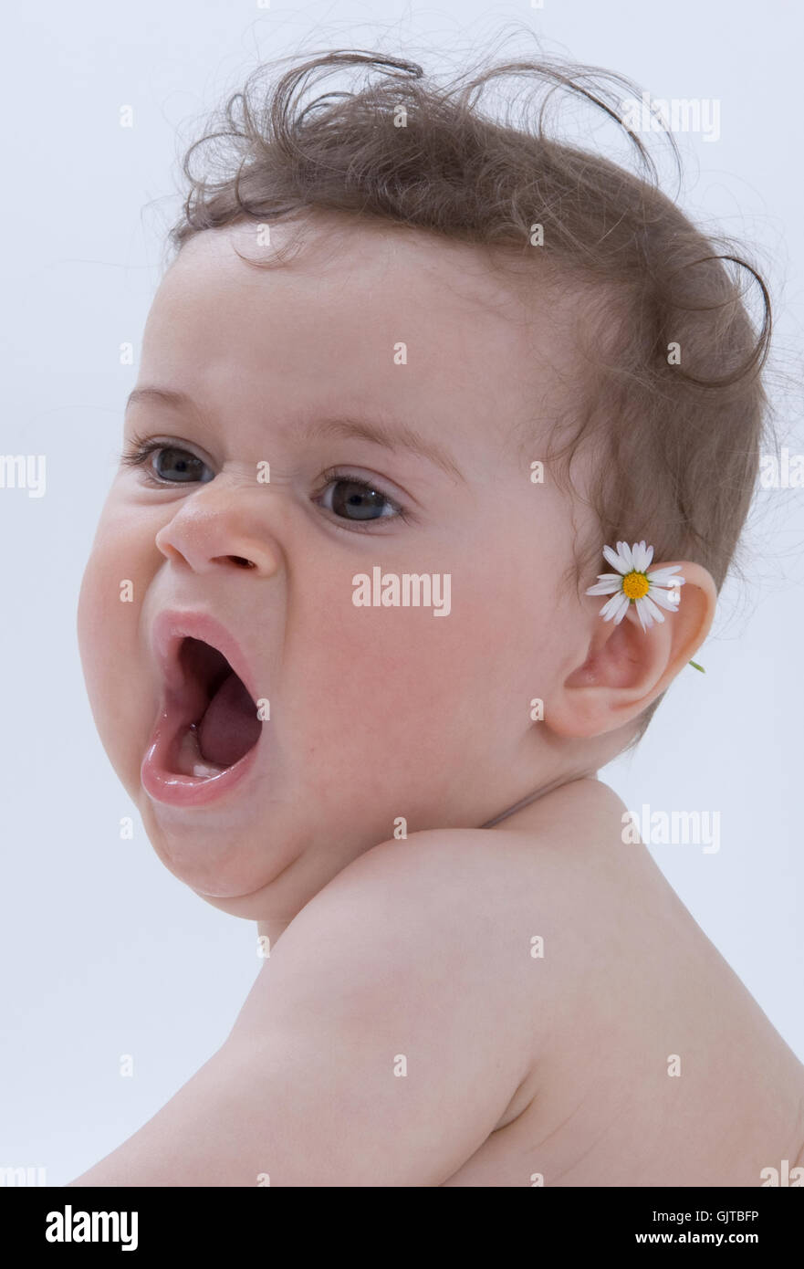 Baby with flower hi-res stock photography and images - Alamy