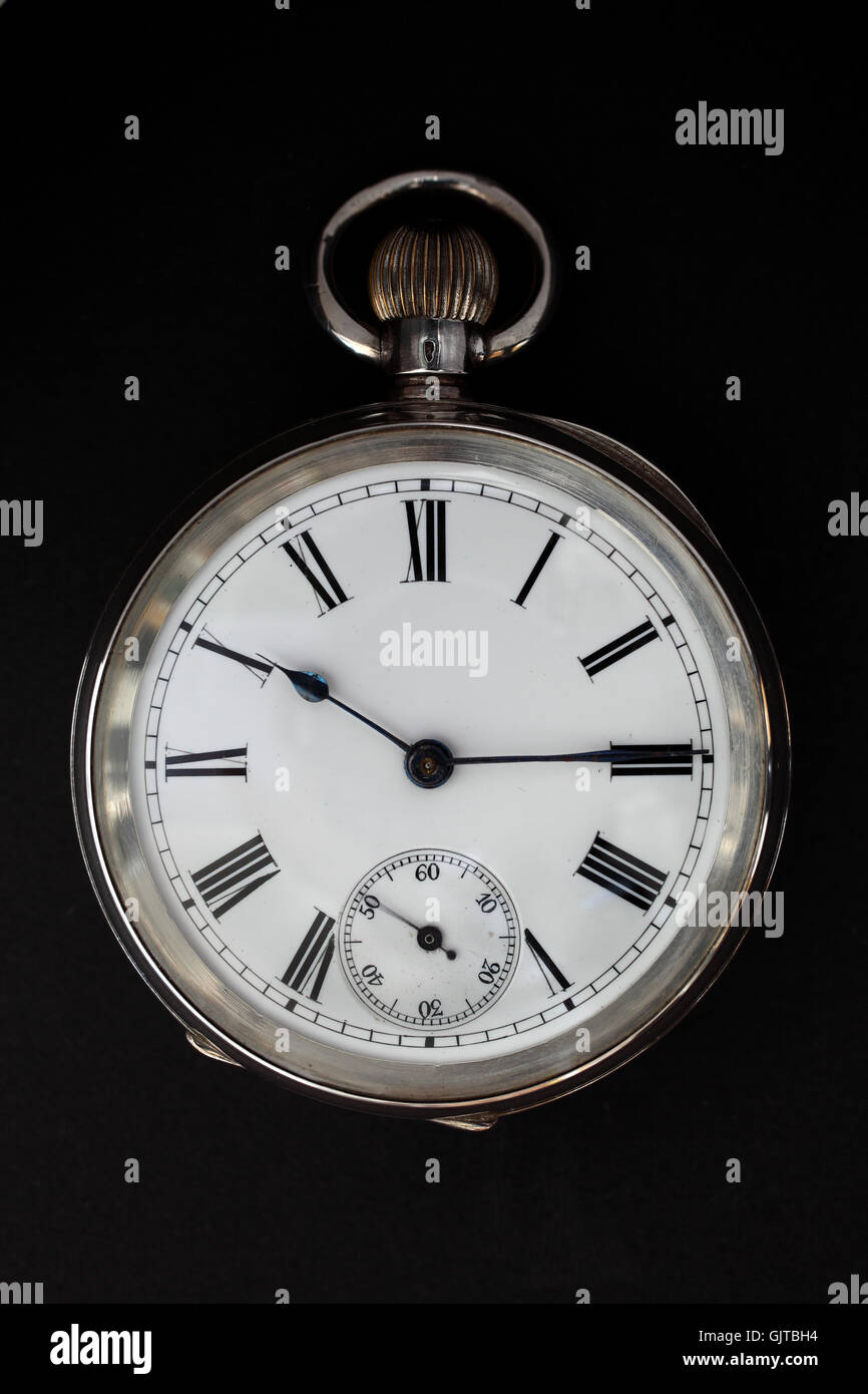 pocket with hand dial Stock Photo - Alamy