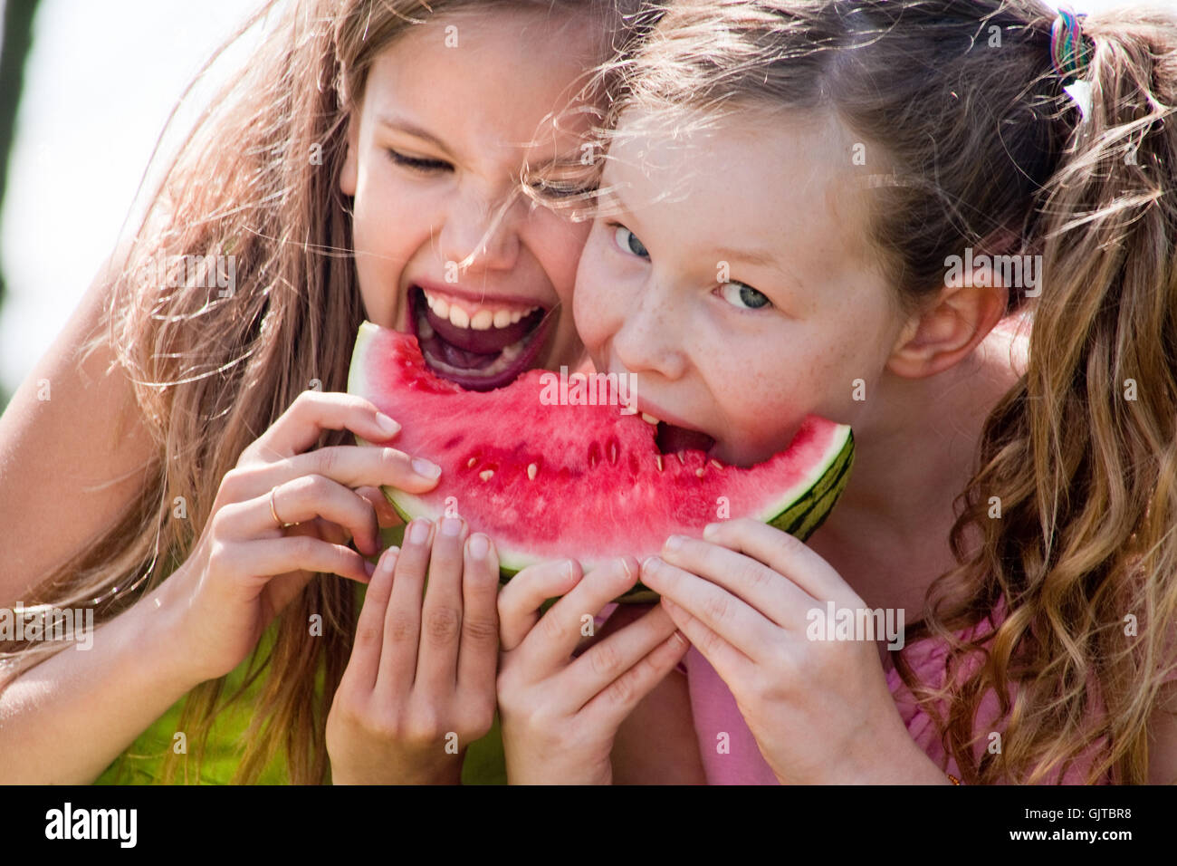 laugh laughs laughing Stock Photo - Alamy
