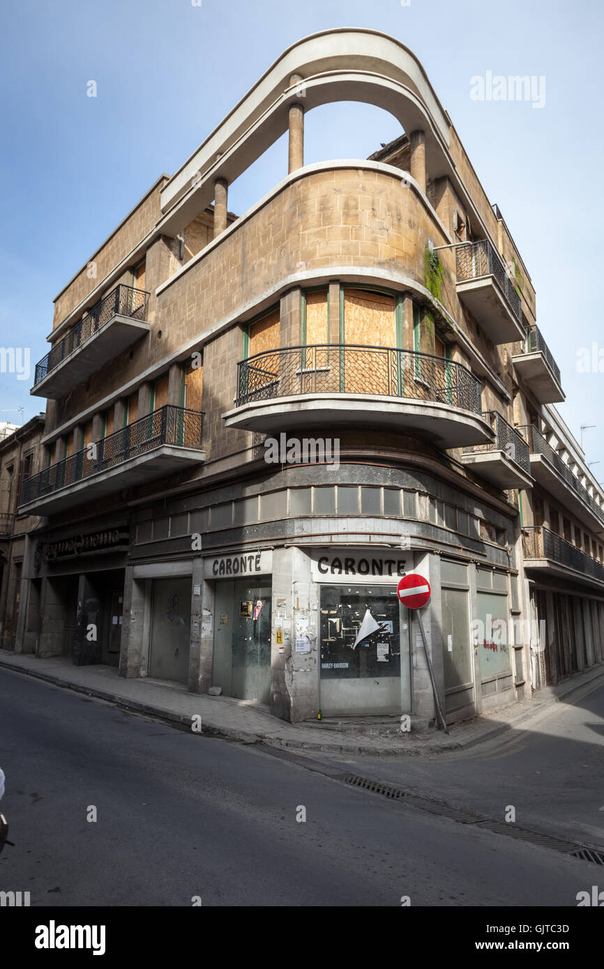 A curved building on a street corner in Cyprus Stock Photo - Alamy