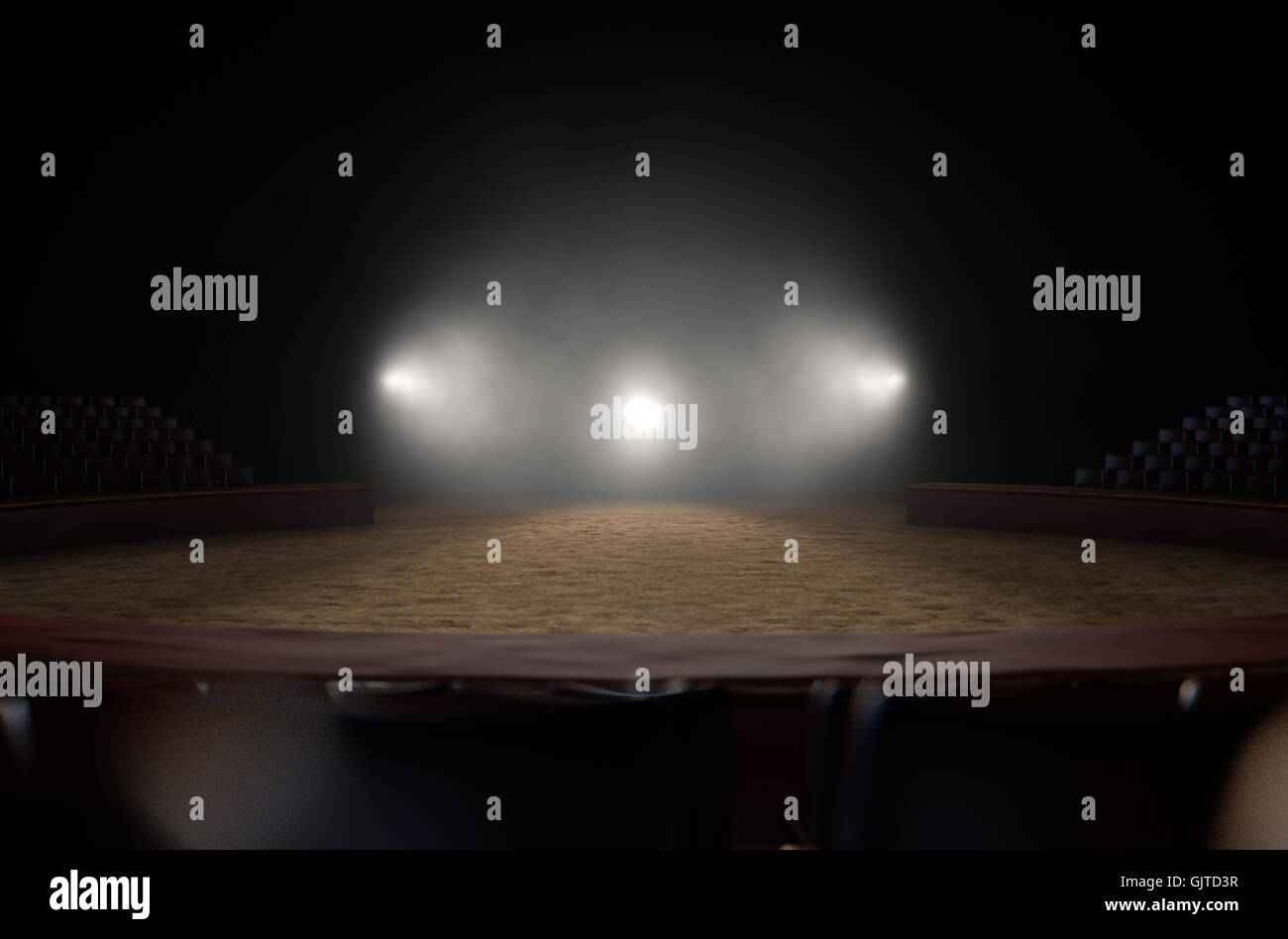A 3D render of an empty classic circus arena back lit by dramatic spot ...