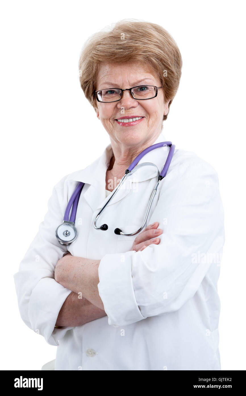 Portrait of confident happy senior woman in doctor uniform, looking at ...