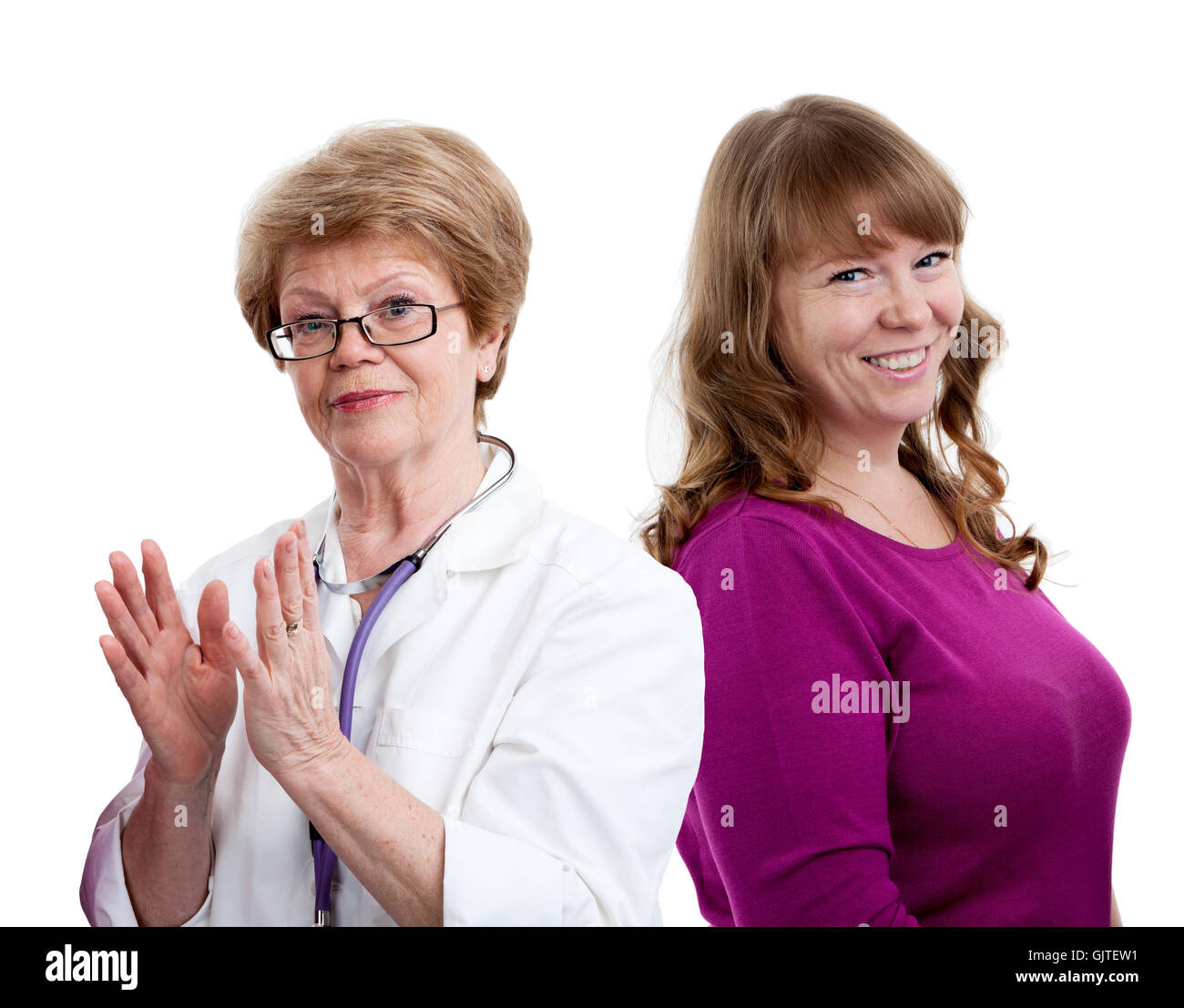 Happy gesturing doctor and laughing female patient behind, looking at ...