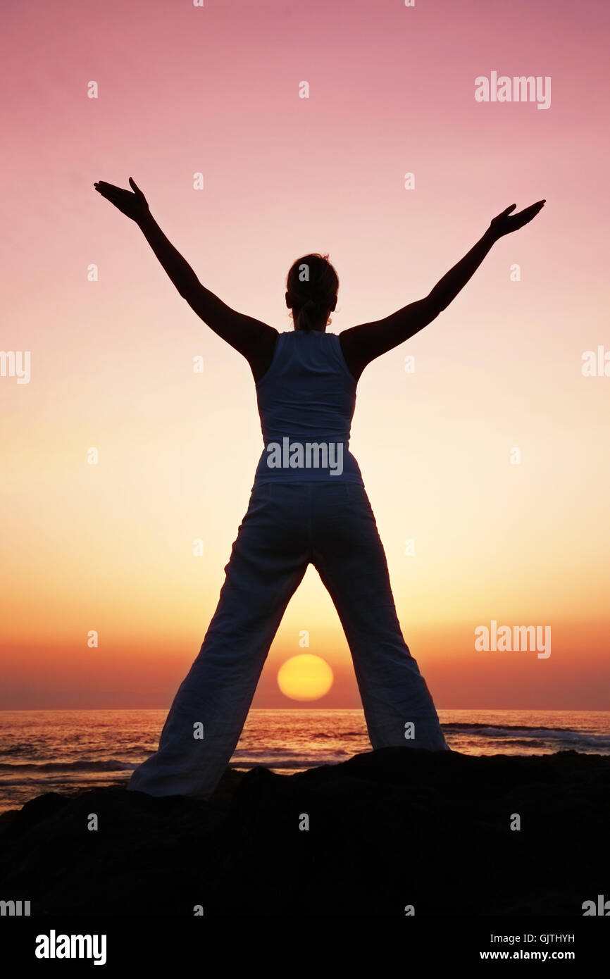 woman sunset dawn Stock Photo - Alamy