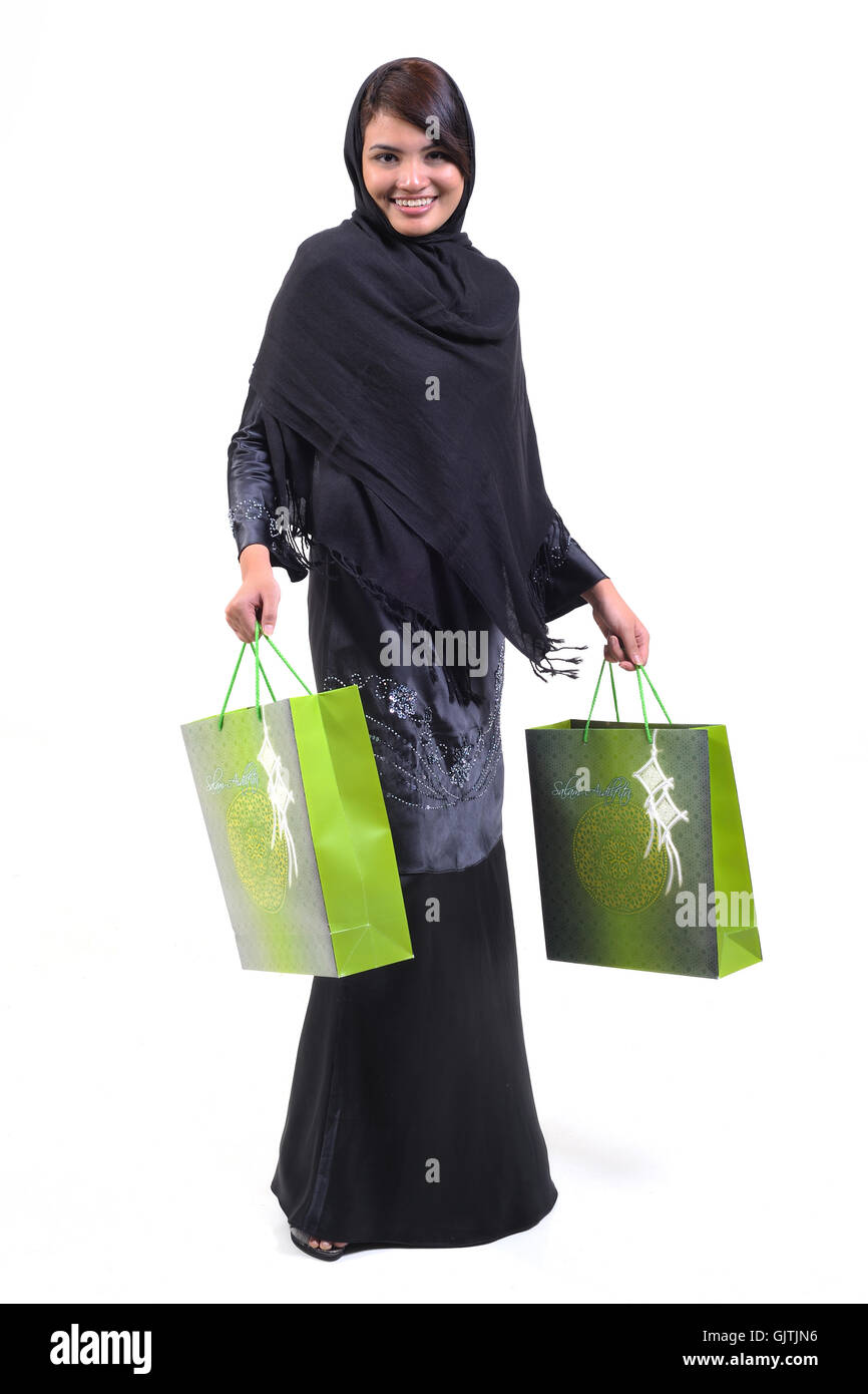 woman green shopping Stock Photo - Alamy
