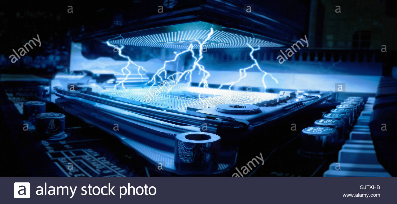 Electrical energy sparks inside computer central processing unit Stock ...