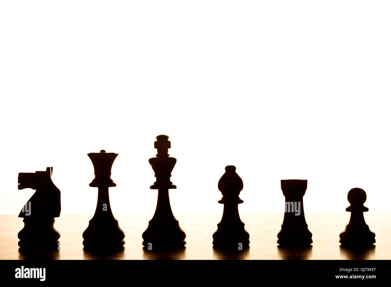chess pieces in silhouette Stock Photo - Alamy