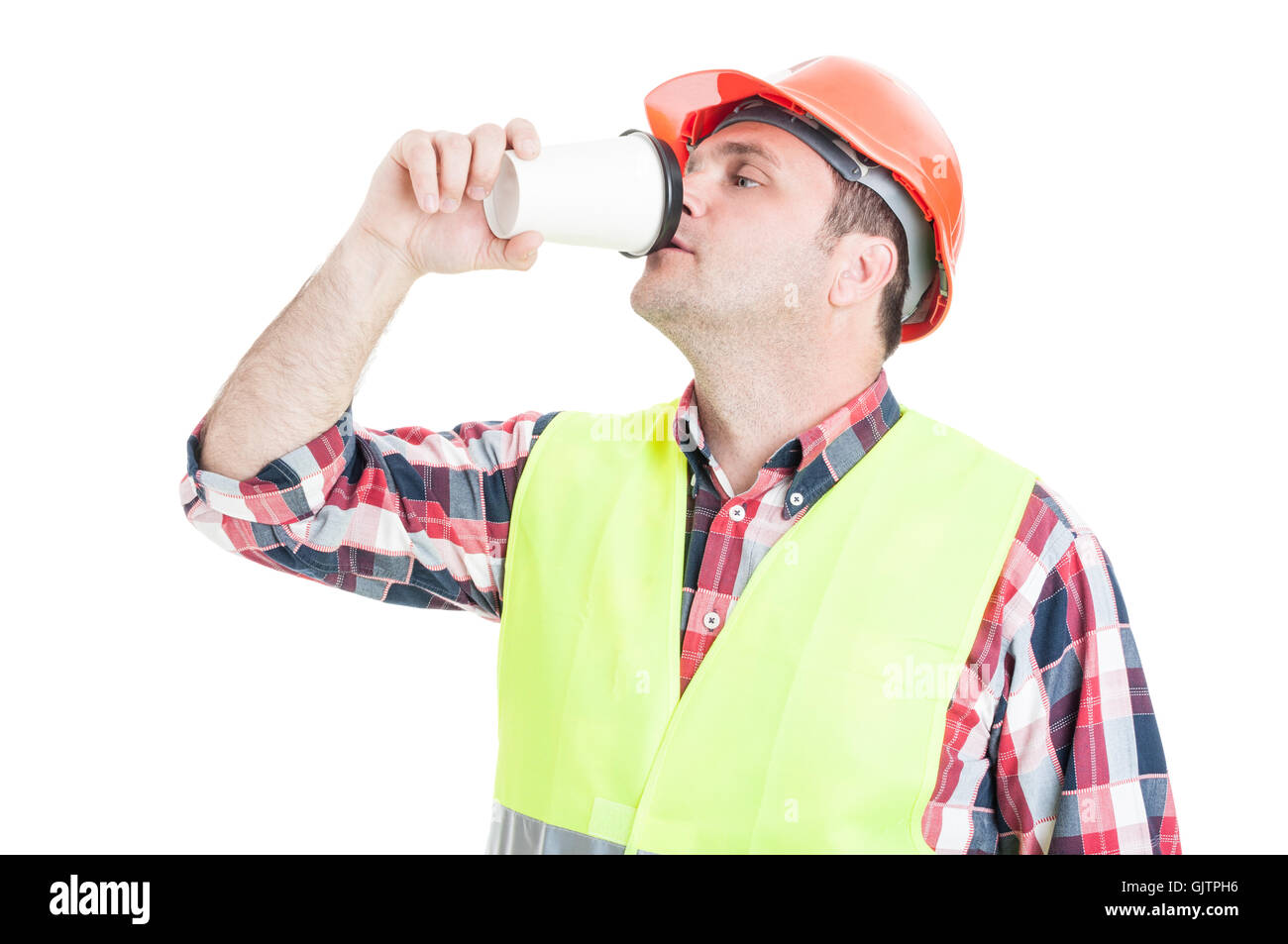 Male engineer drinking hot coffee in his lunch break isolated on white ...