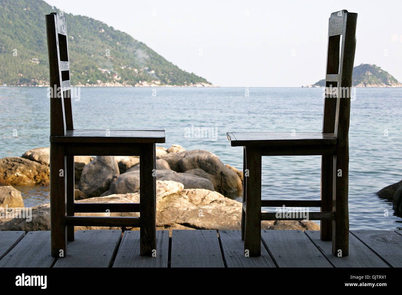 two empty chairs look at each other Stock Photo - Alamy