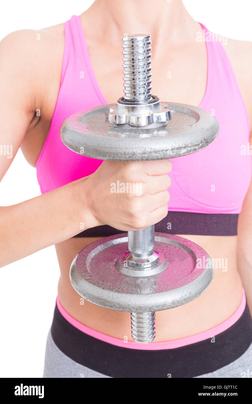 Close-up of female hand lifting heavy weight at gym isolated on white ...