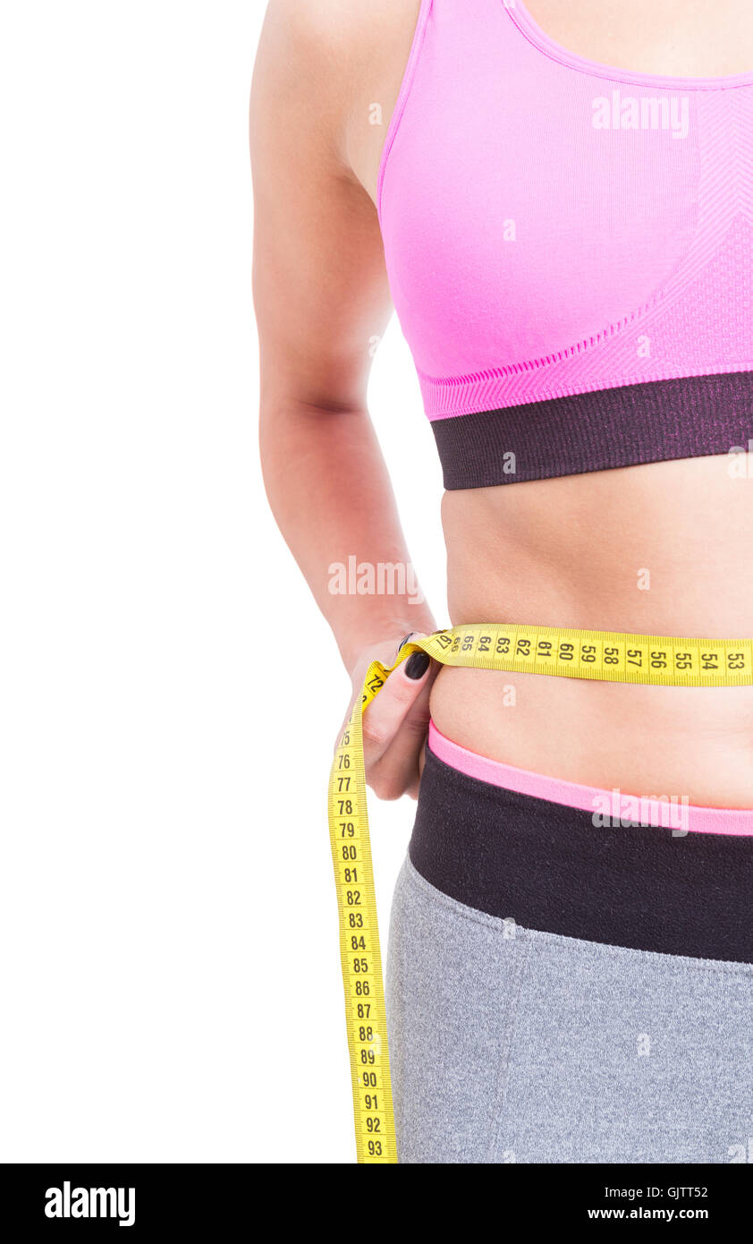 Side view of woman measuring waist with tape line isolated on white ...