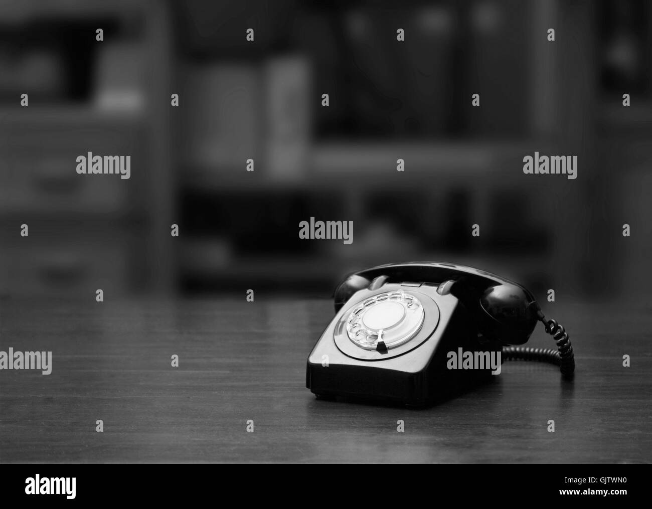 Hand with phone home Black and White Stock Photos & Images - Alamy