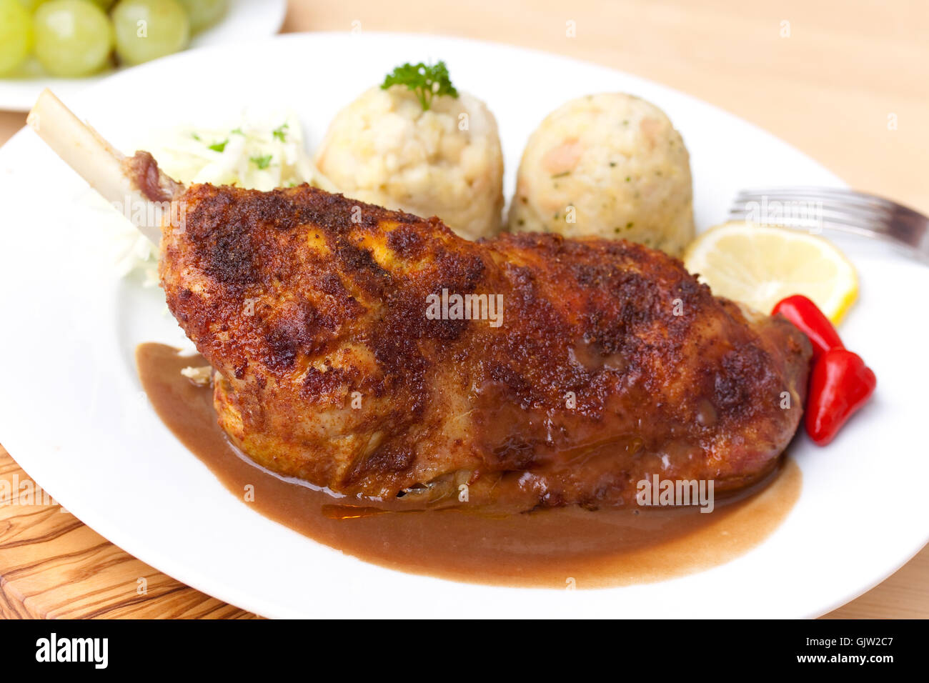goose leg with sauce,dumplings-fried Stock Photo - Alamy