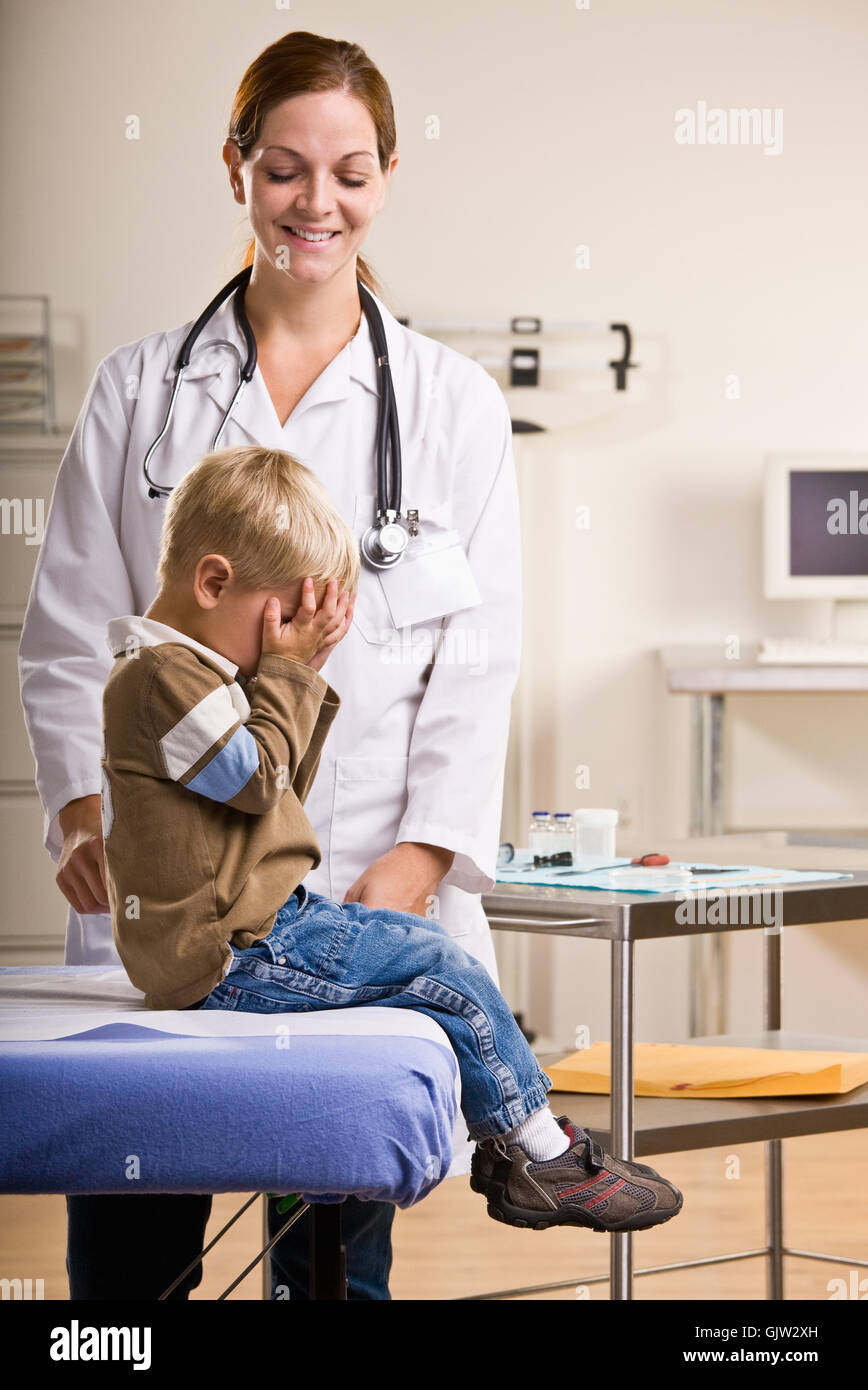 Boy crying at doctors hi-res stock photography and images - Alamy