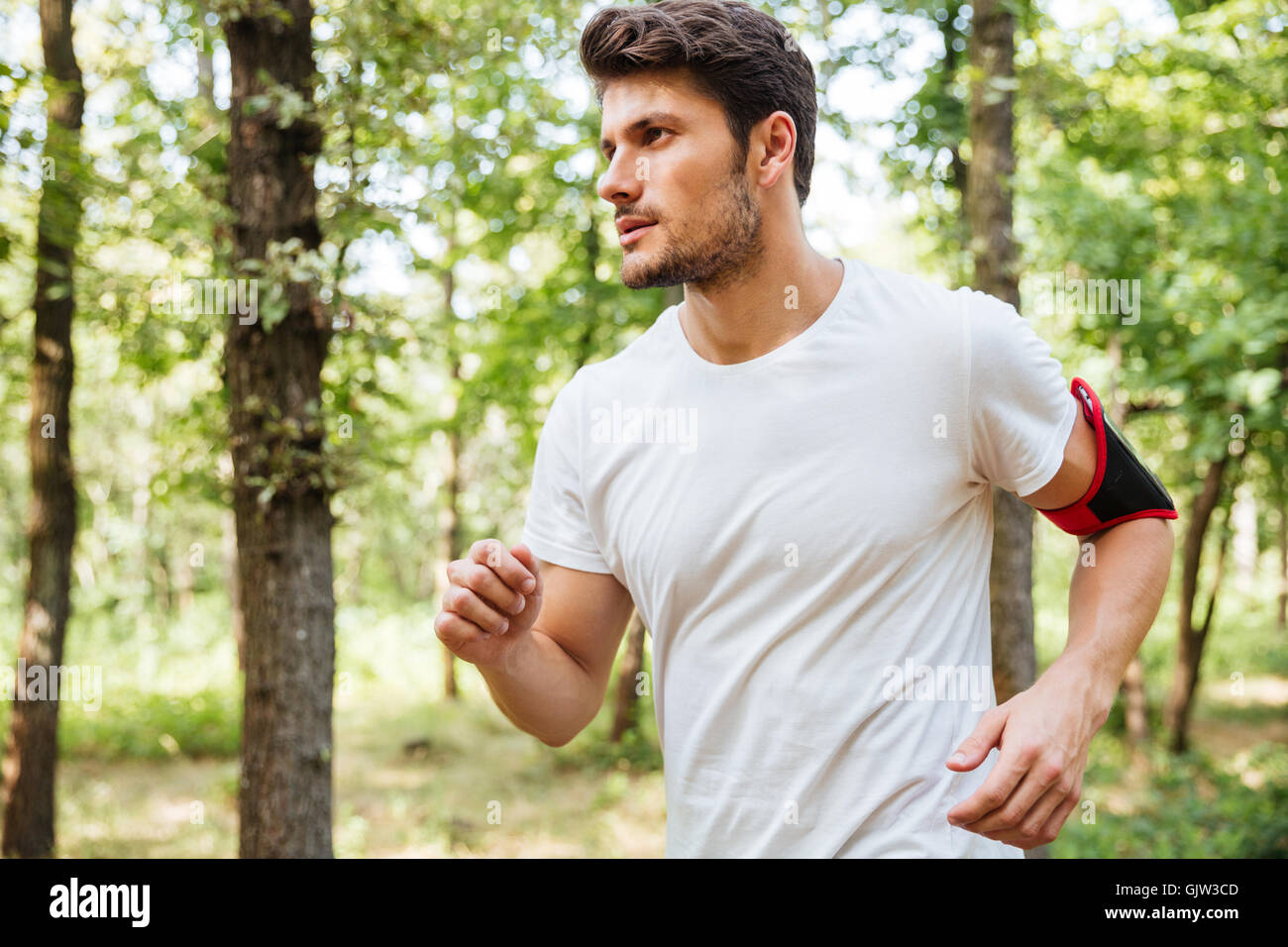 Handsome man running hi-res stock photography and images - Alamy